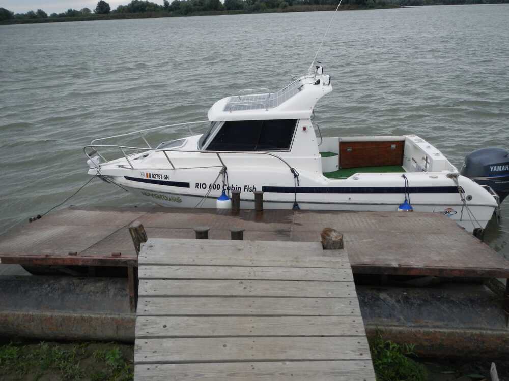PRO BARCA - Vand barca RIO 600 CABIN FISH + motor 150 CP + peridoc